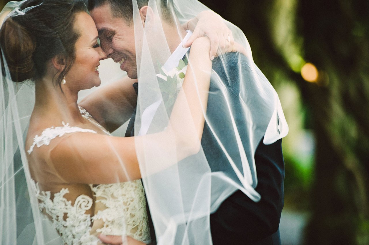 Bride & Groom Portrait Under Veil