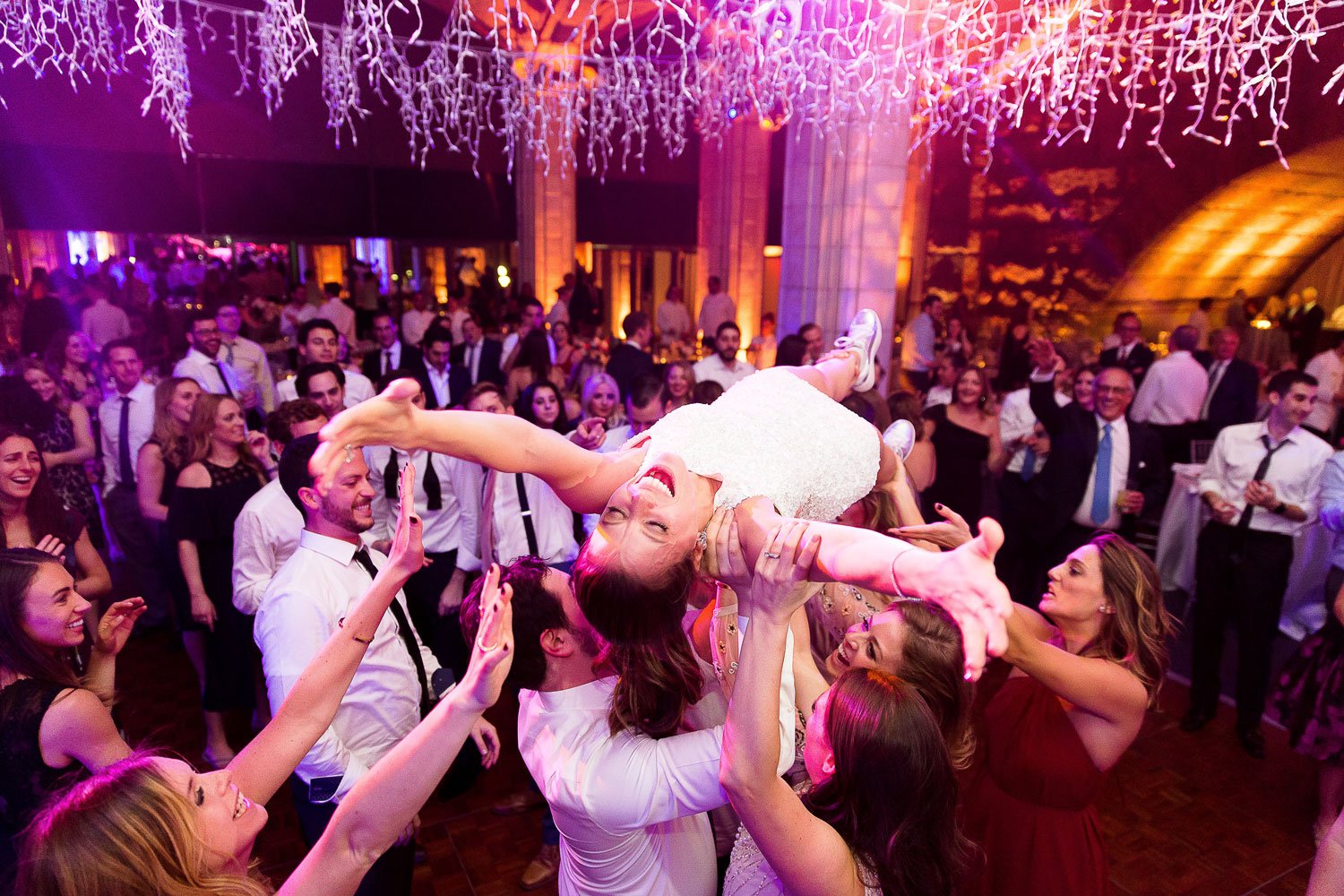 Bride Crowd-Surfing at Reception