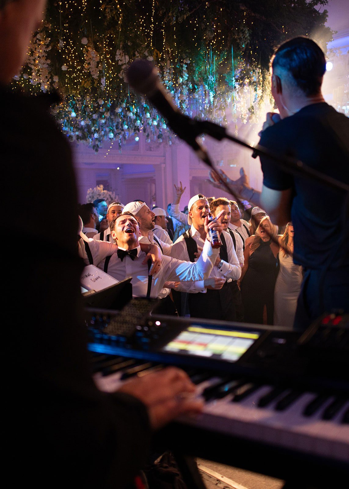 Guests in Hats Singing with Live Band