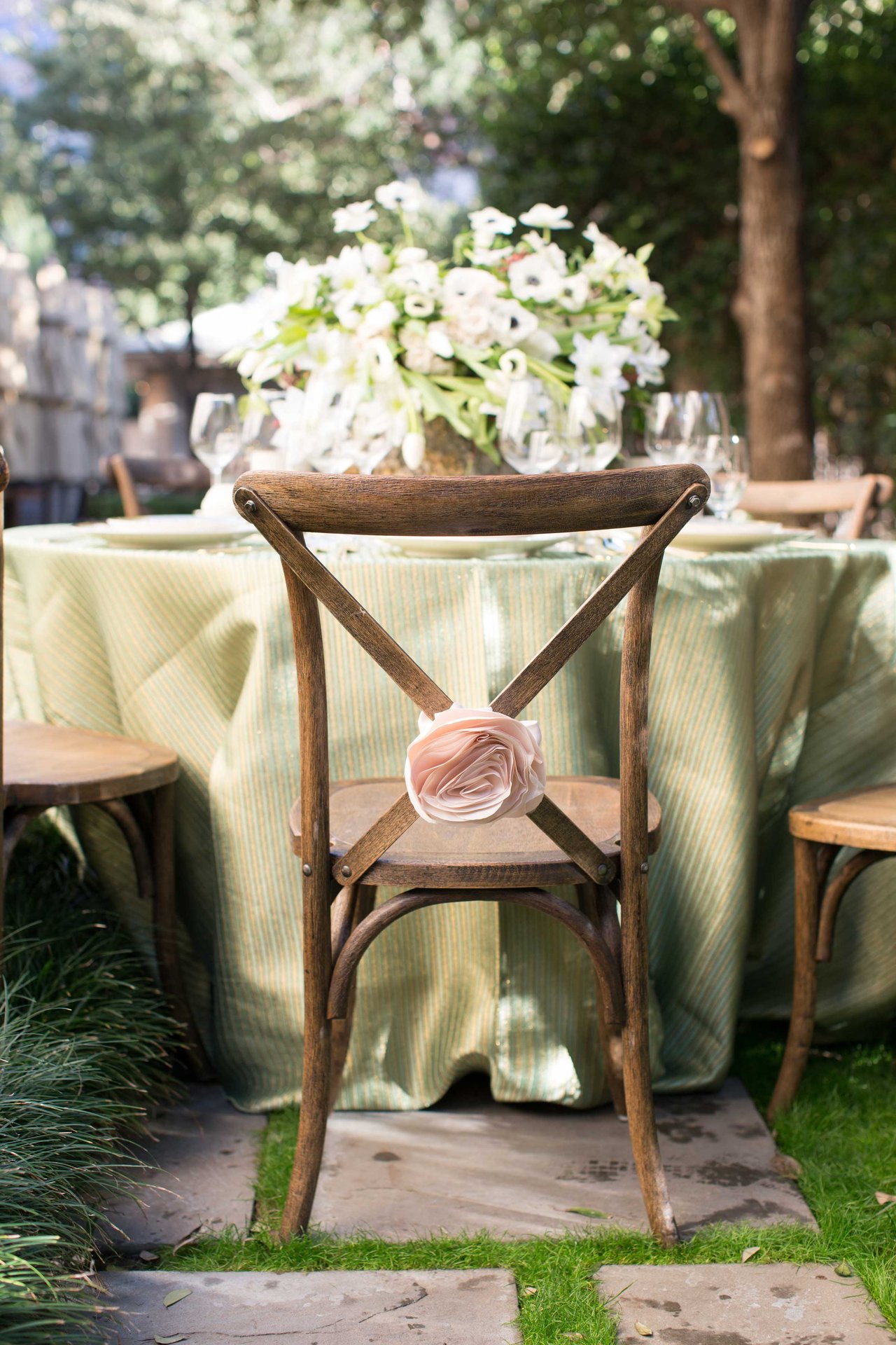 Wooden Chair with Pink Flower and Green Tablescape