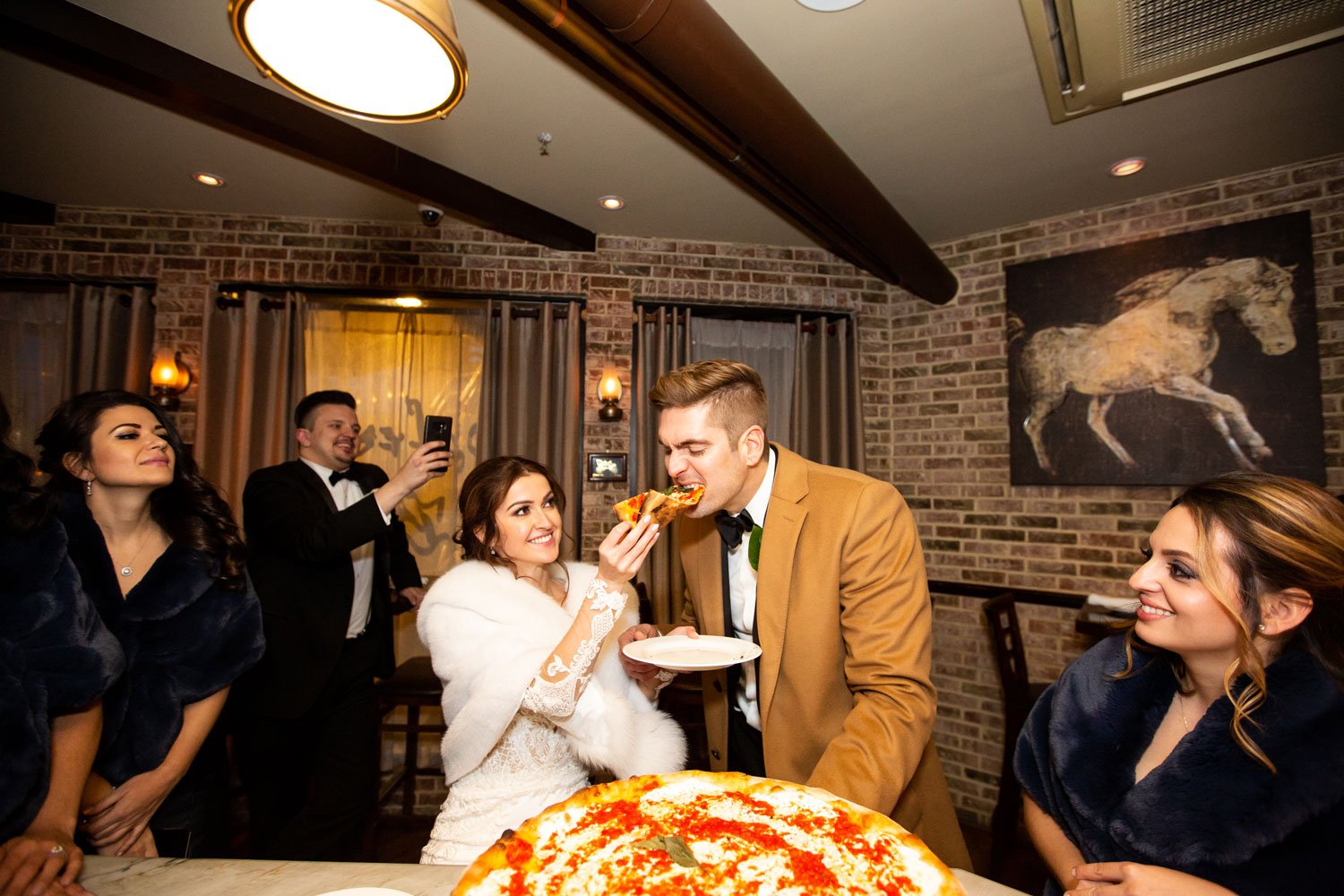 Bride & Groom Eating Pizza at After-Party
