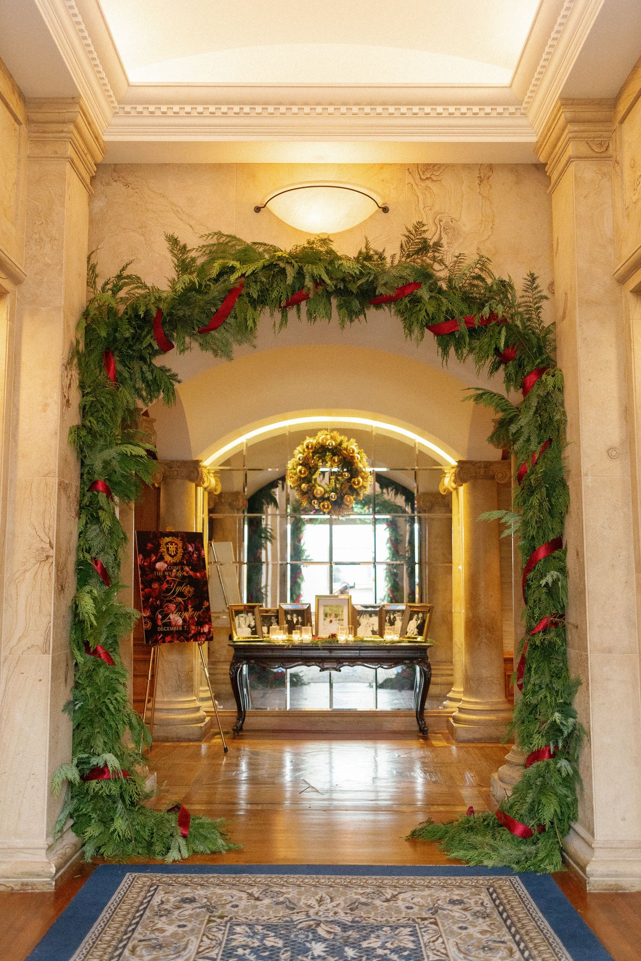Garland & Red Ribbon Entry to Holiday Wedding