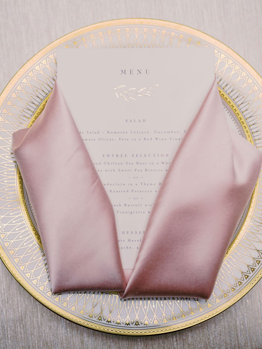 Elegant Menu Nestled in Pink Napkin