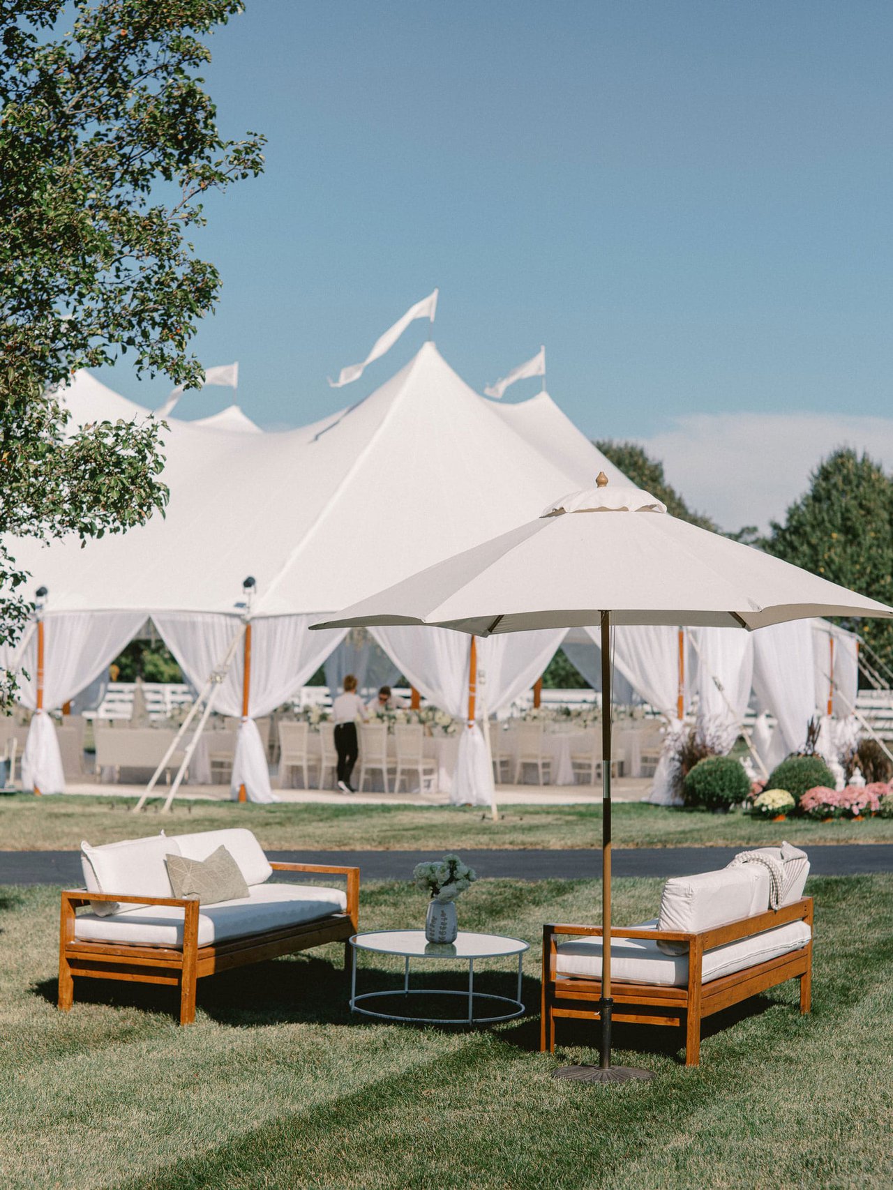 Lounge Area with Umbrella Outside Tent