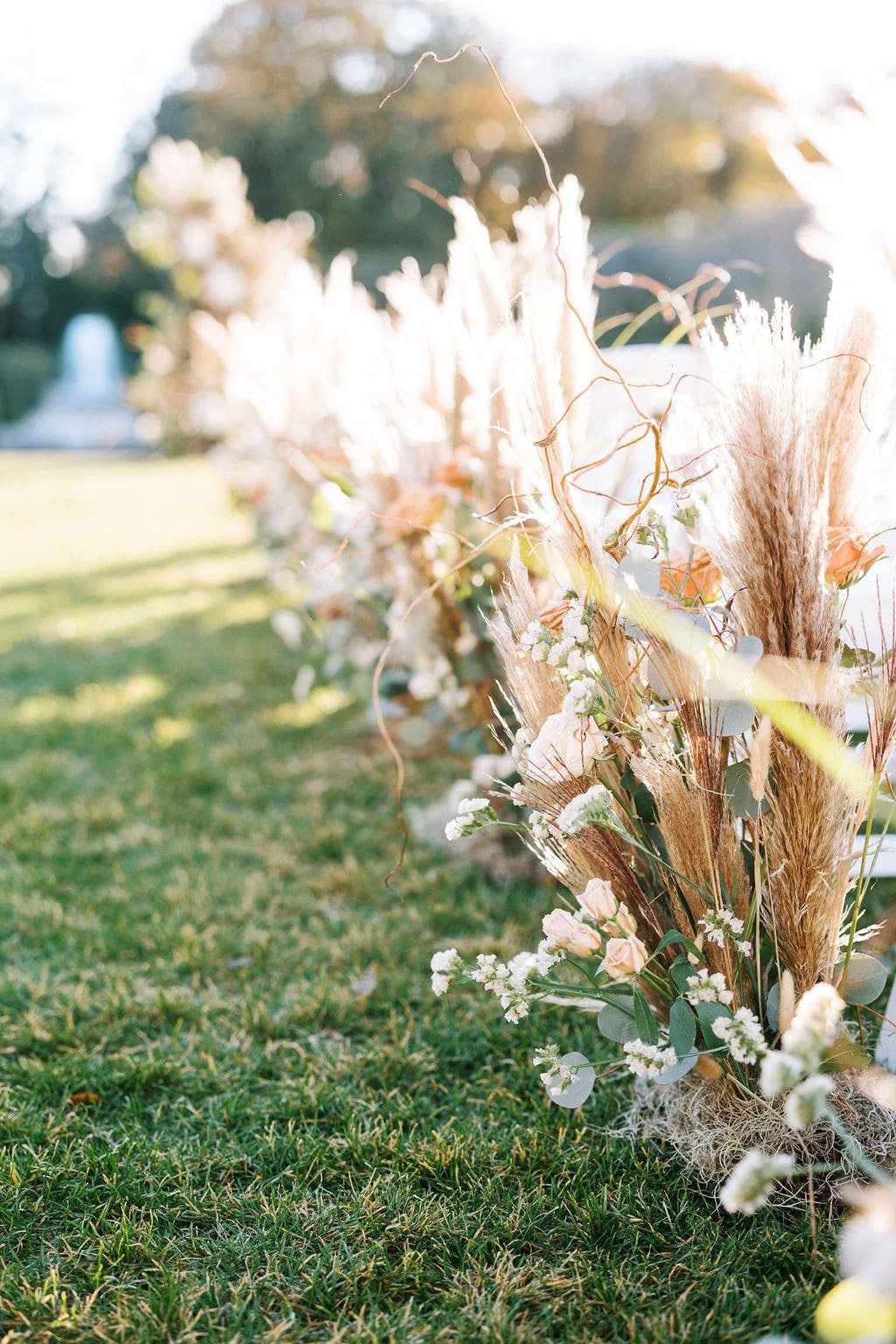 Pampas Grass Along Grass Ceremony Aisle