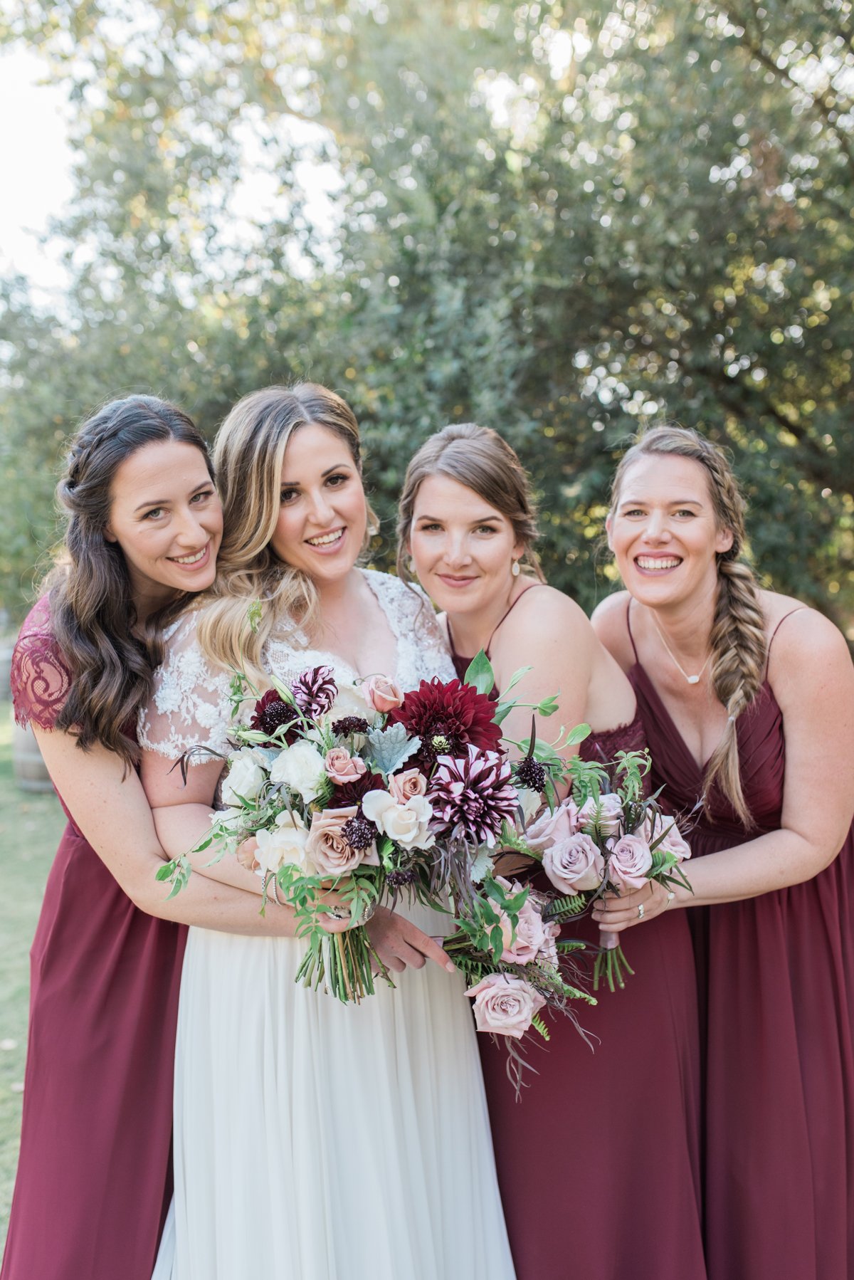 Bridesmaids Hugging Bride