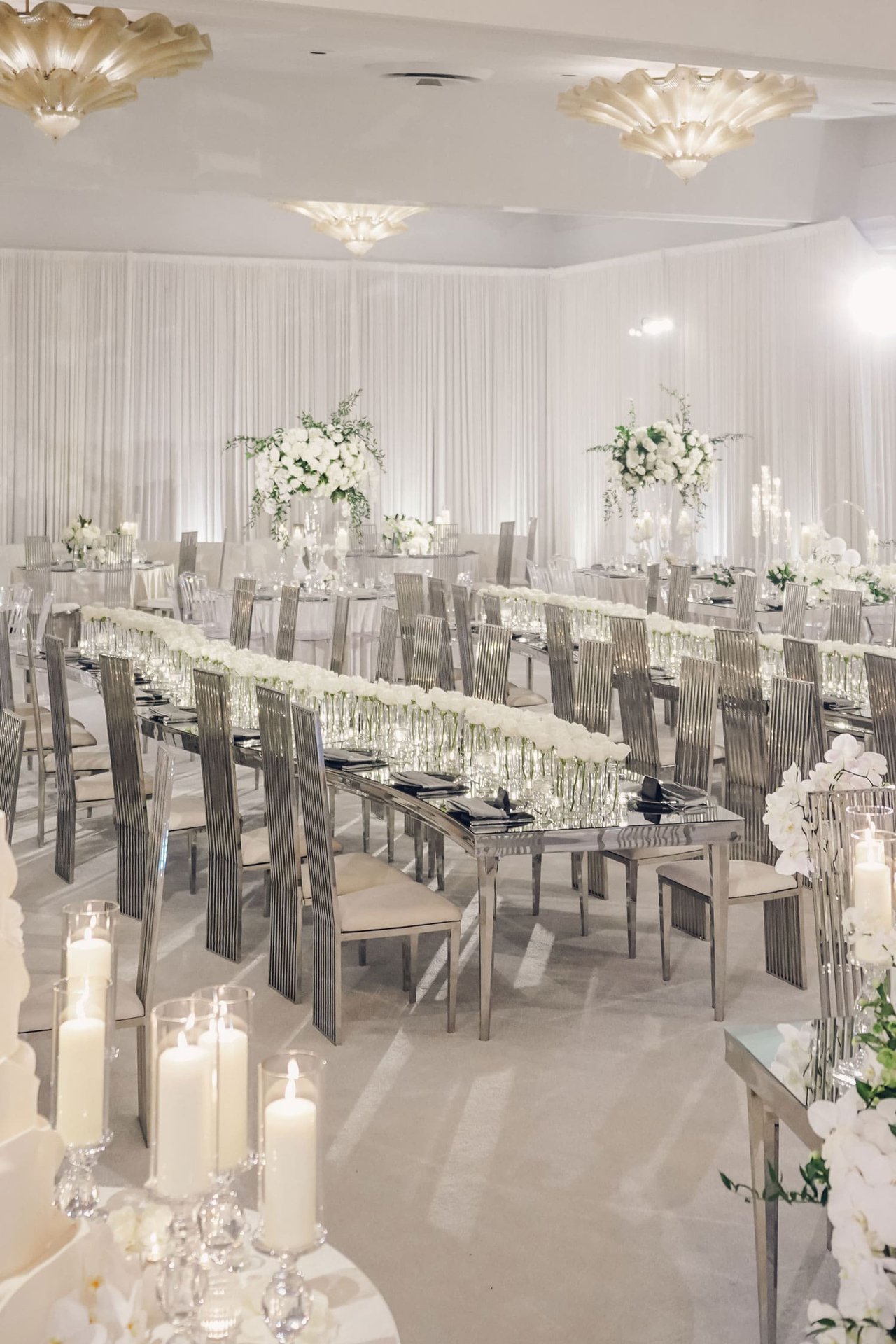 Modern Silver Chairs & Serpentine Tables