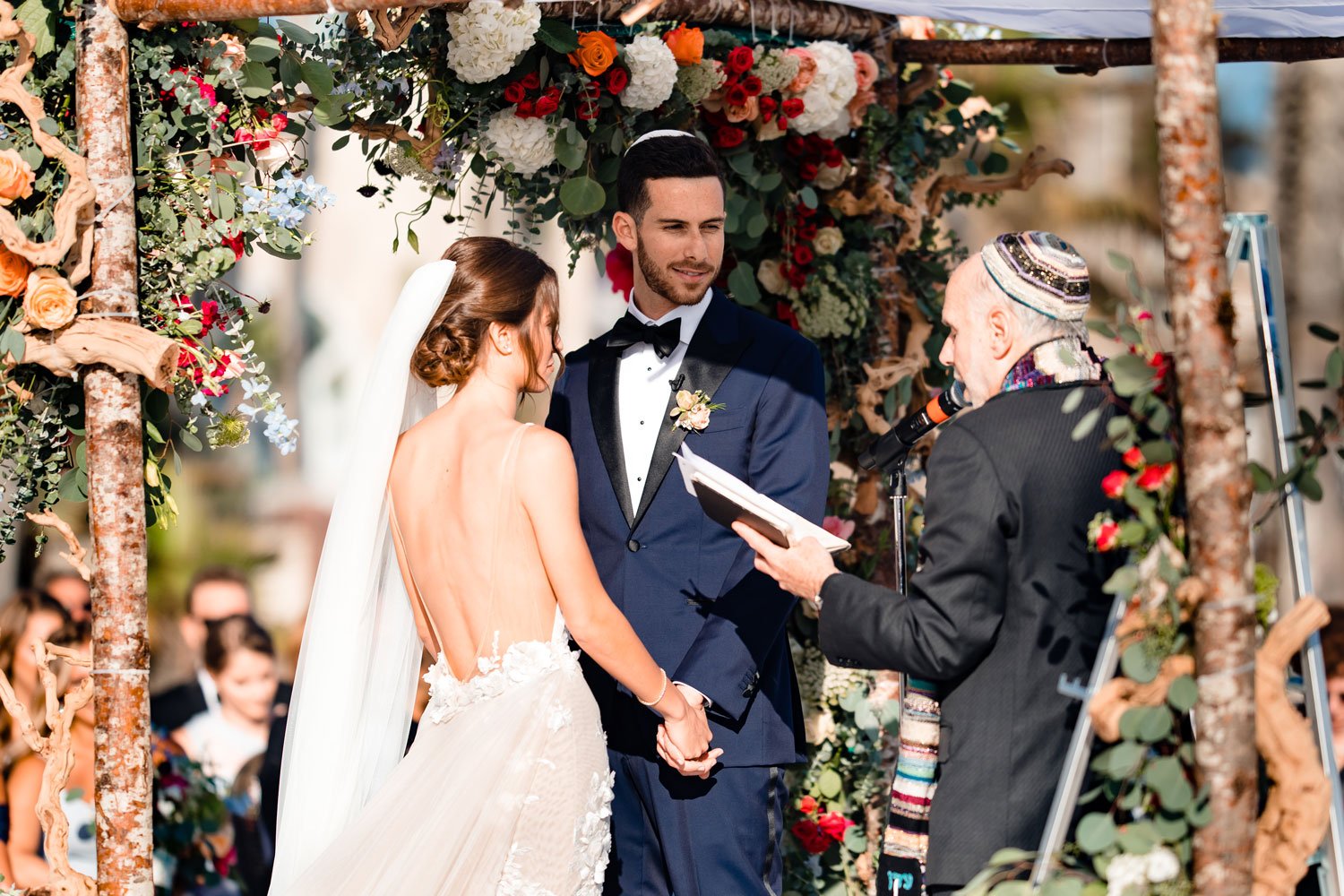Bride and Groom with Rabbi at Ceremony