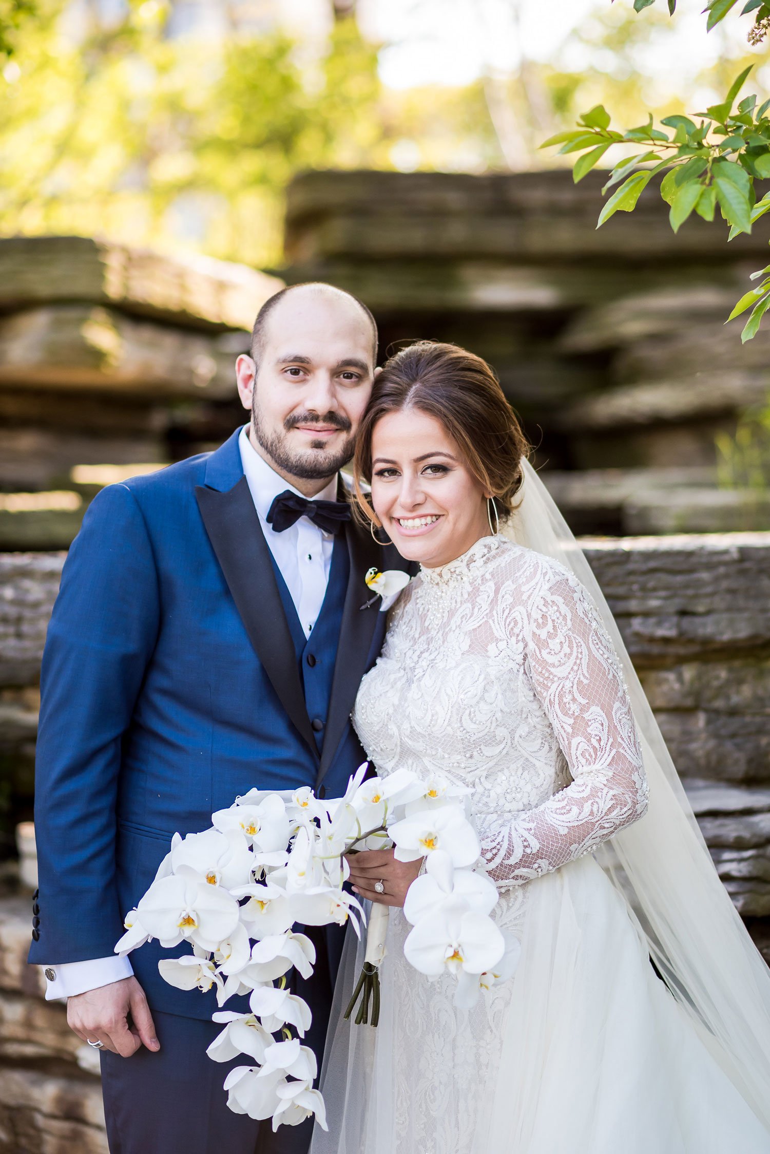 Bride & Groom in Elegant Ensembles