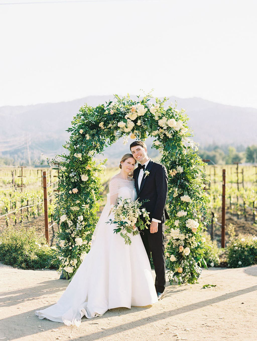 Bride & Groom Under Arch in Napa Valley