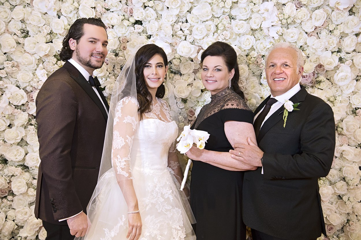 Groom's Family in Front of Floral Wall