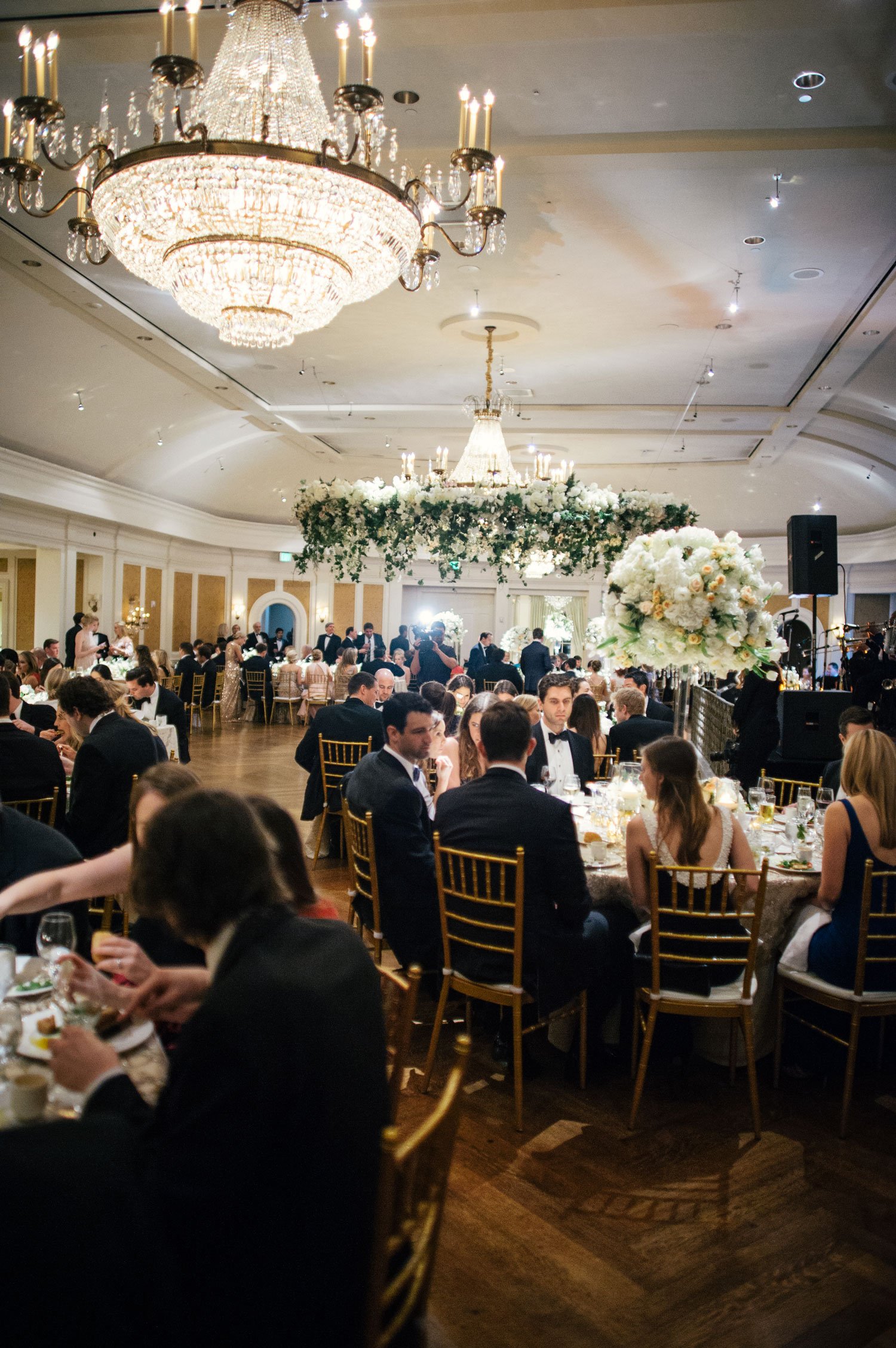 Guests Sitting at Round Reception Tables
