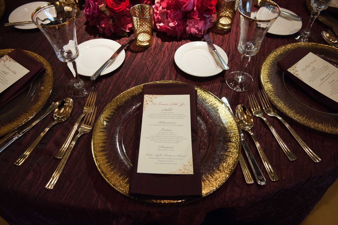 Gold Place Setting on Eggplant Linen