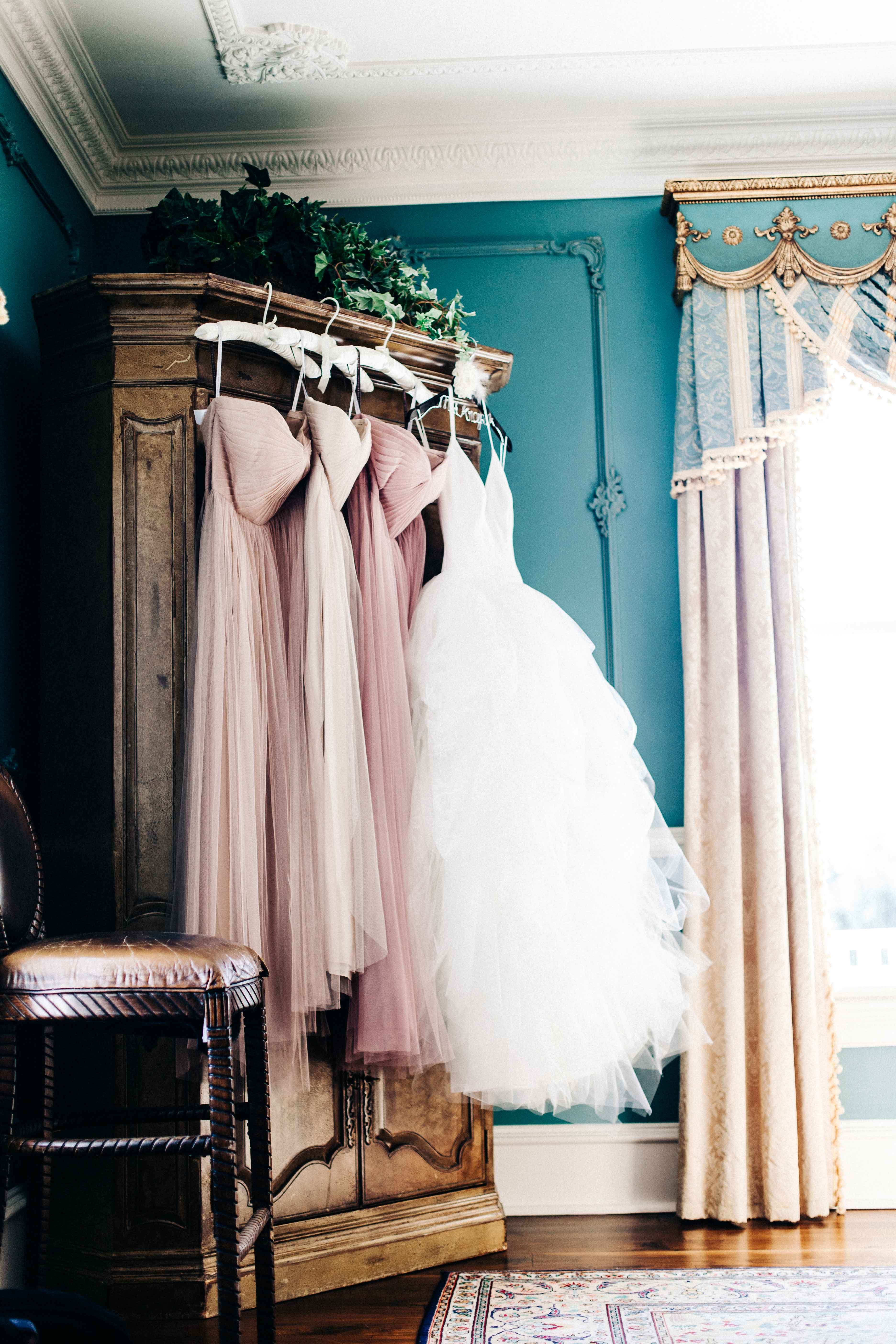 Bride and Bridesmaid Dresses Hanging Up