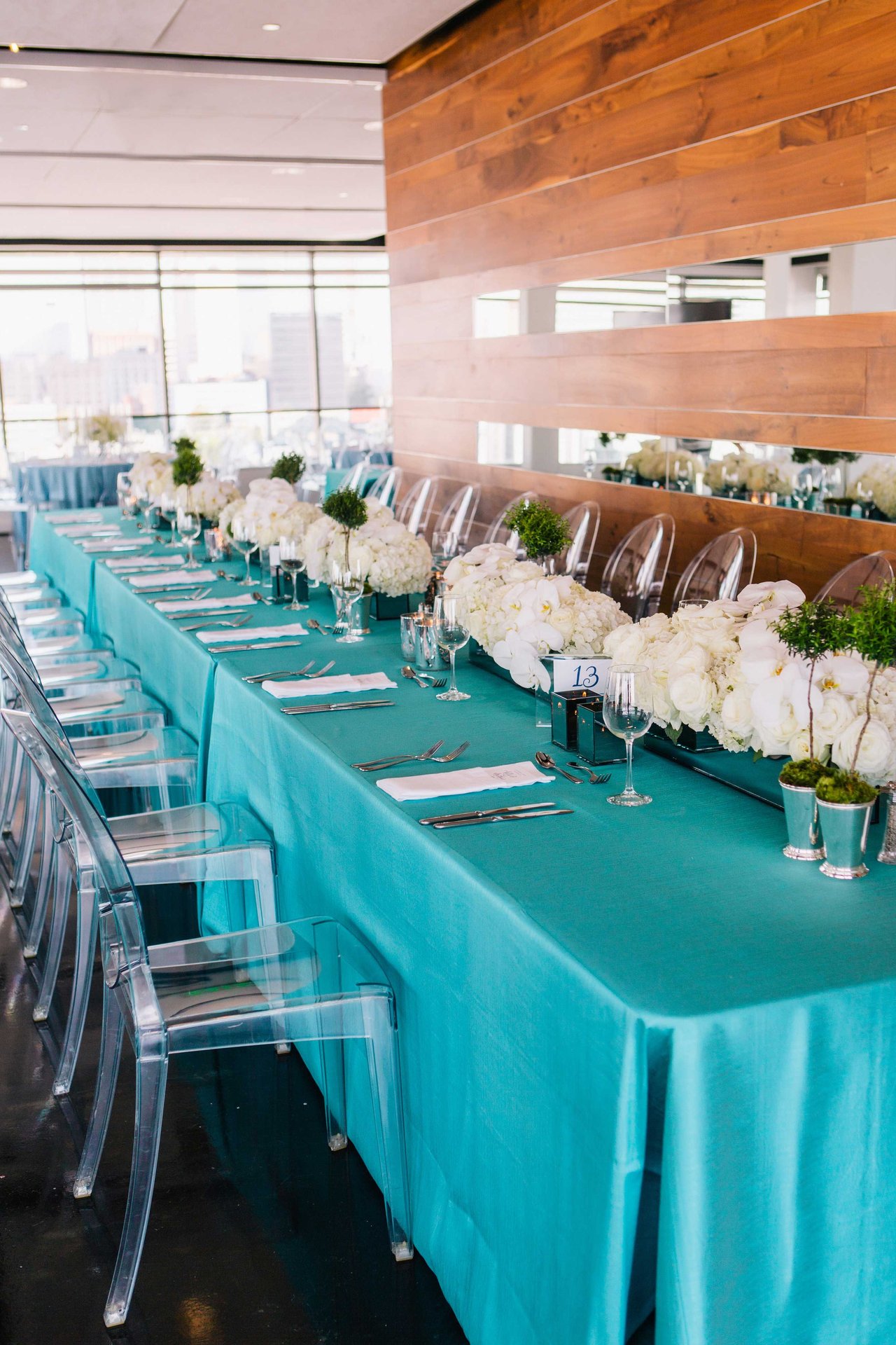 Tiffany Blue Linens, Ghost Chairs, and White Flowers