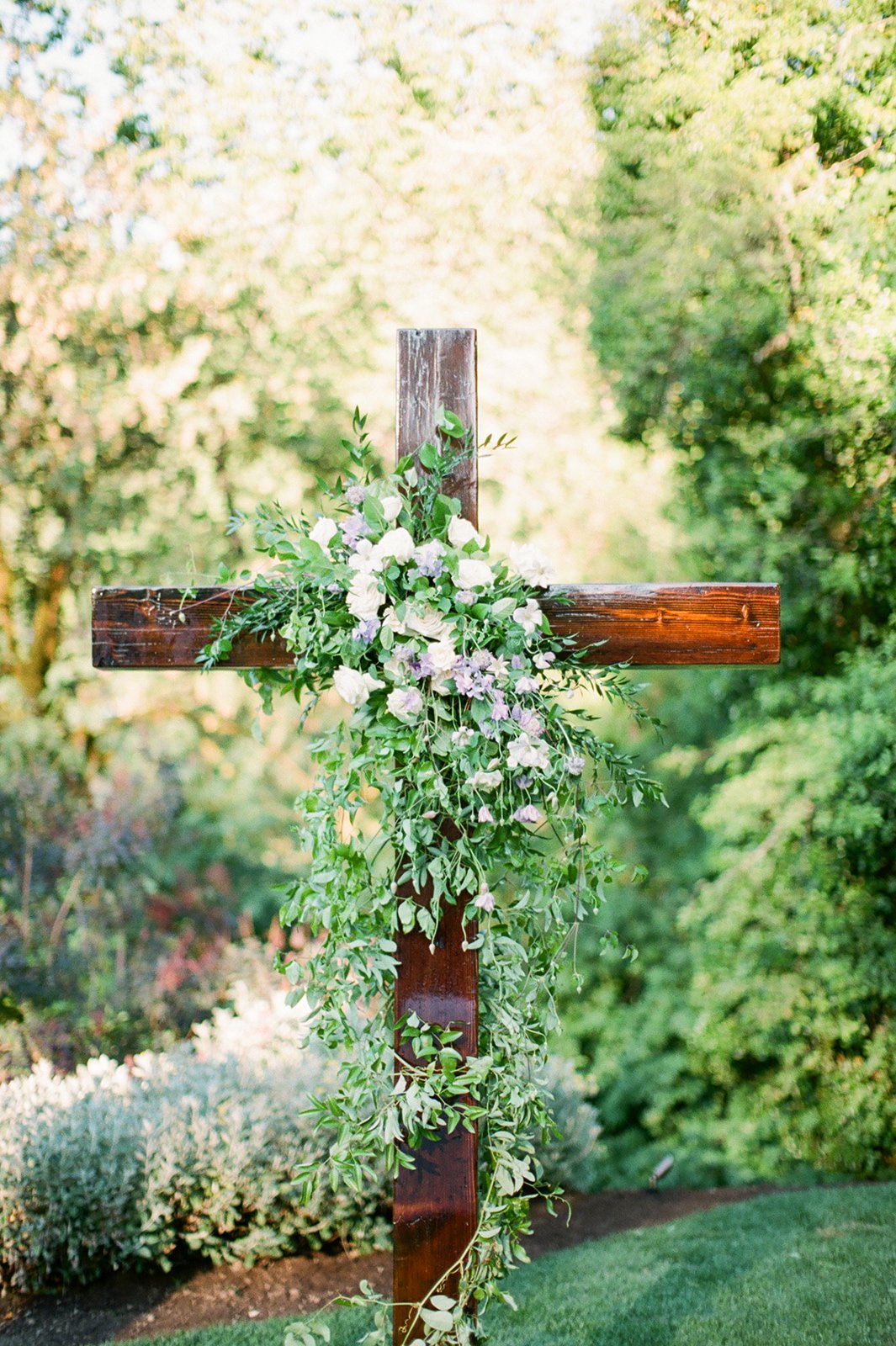 Wooden Cross Adorned with Verdure