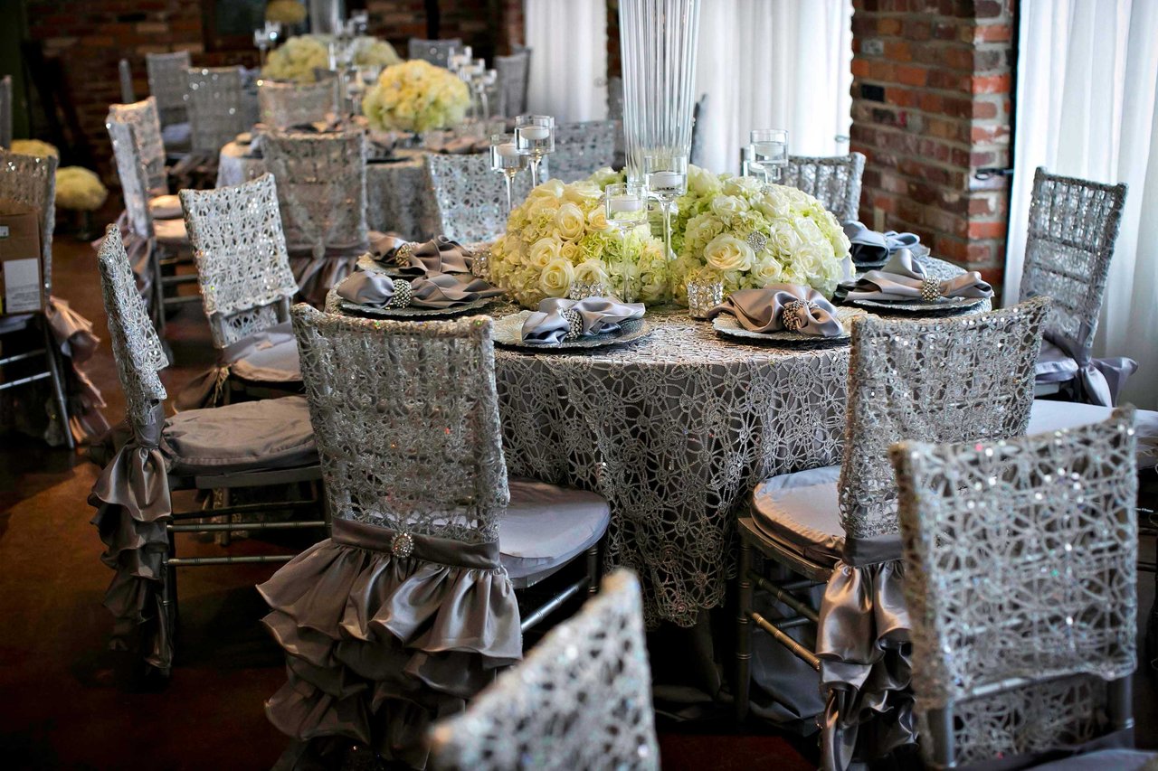 Ivory Flower Arrangements on Silver Tables
