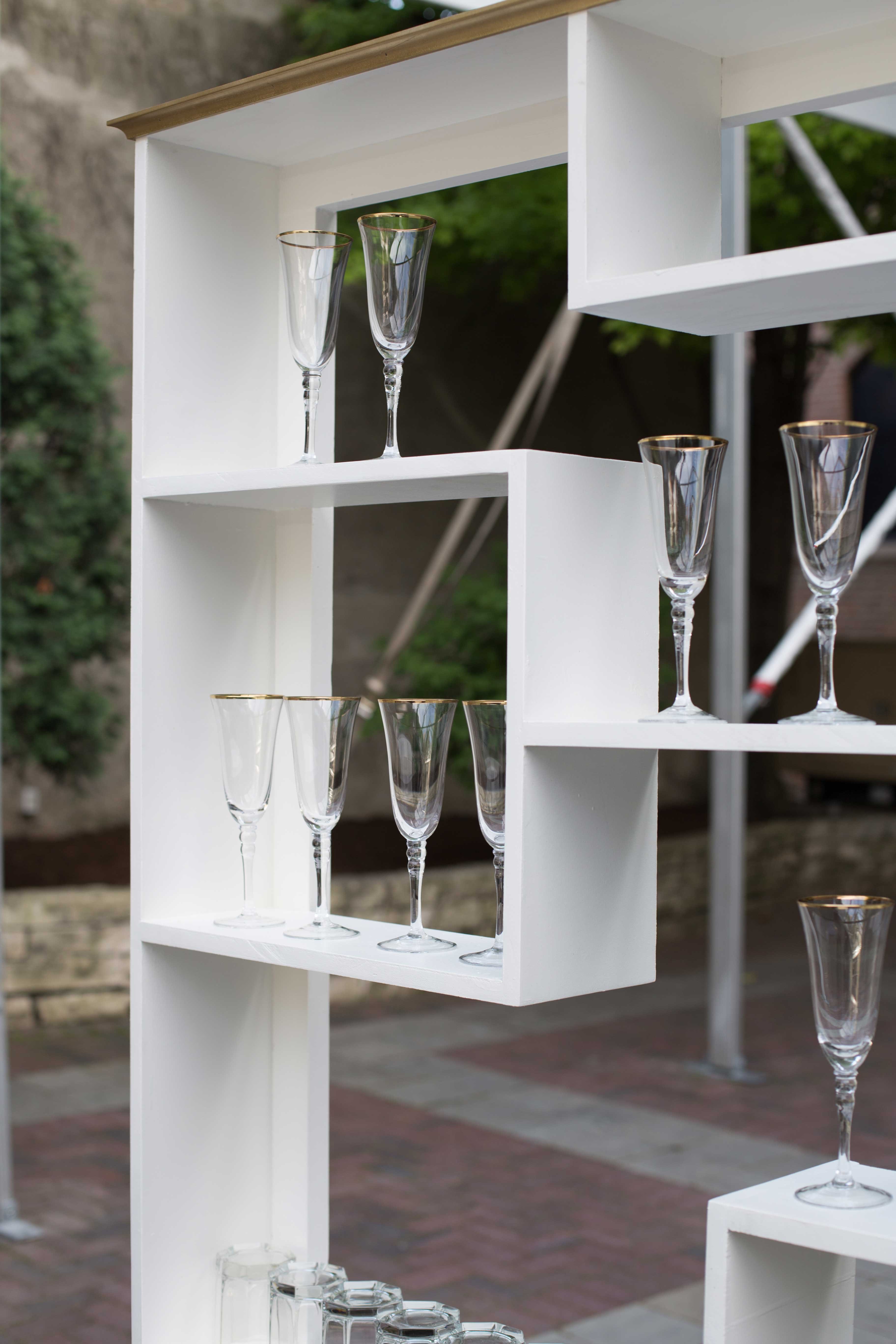 Multiple-Leveled Shelf Behind Bar