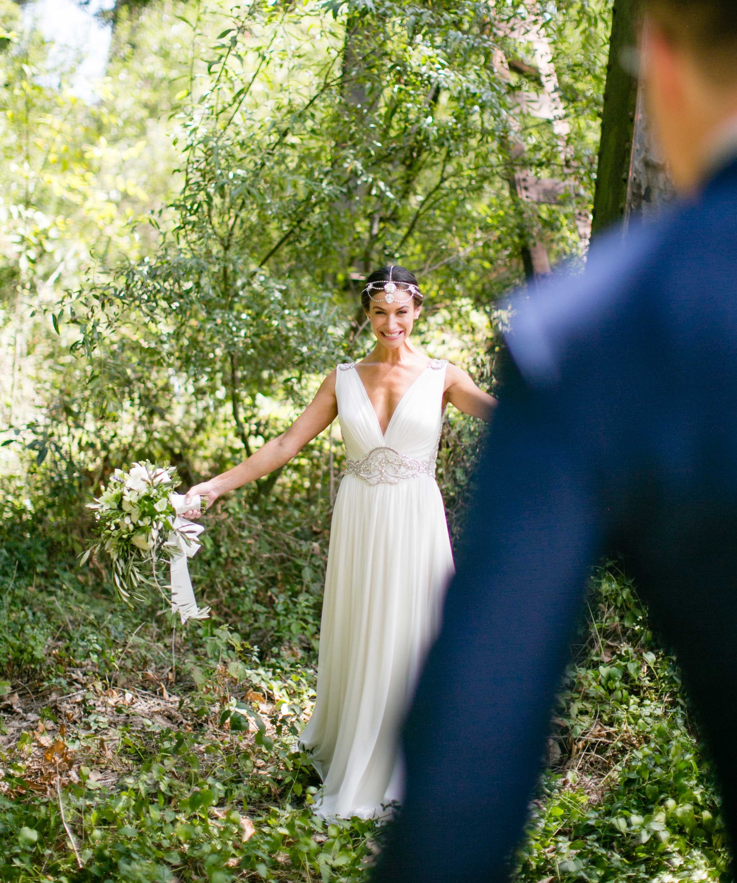 Bride with Open Arms During "First Look"