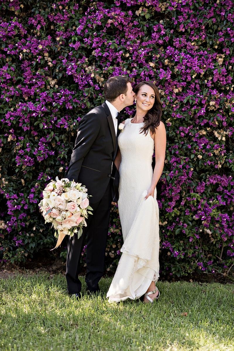 Groom Going to Kiss Bride on Cheek