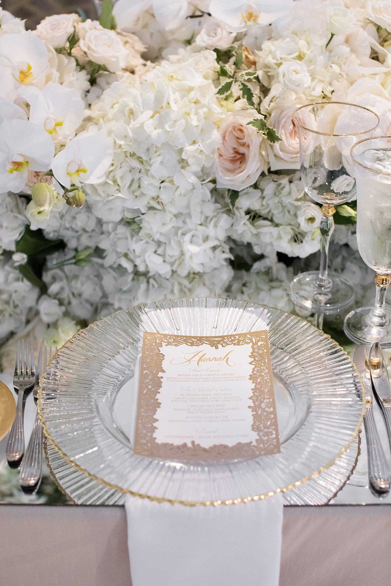 Gold Menu on Mirrored Table