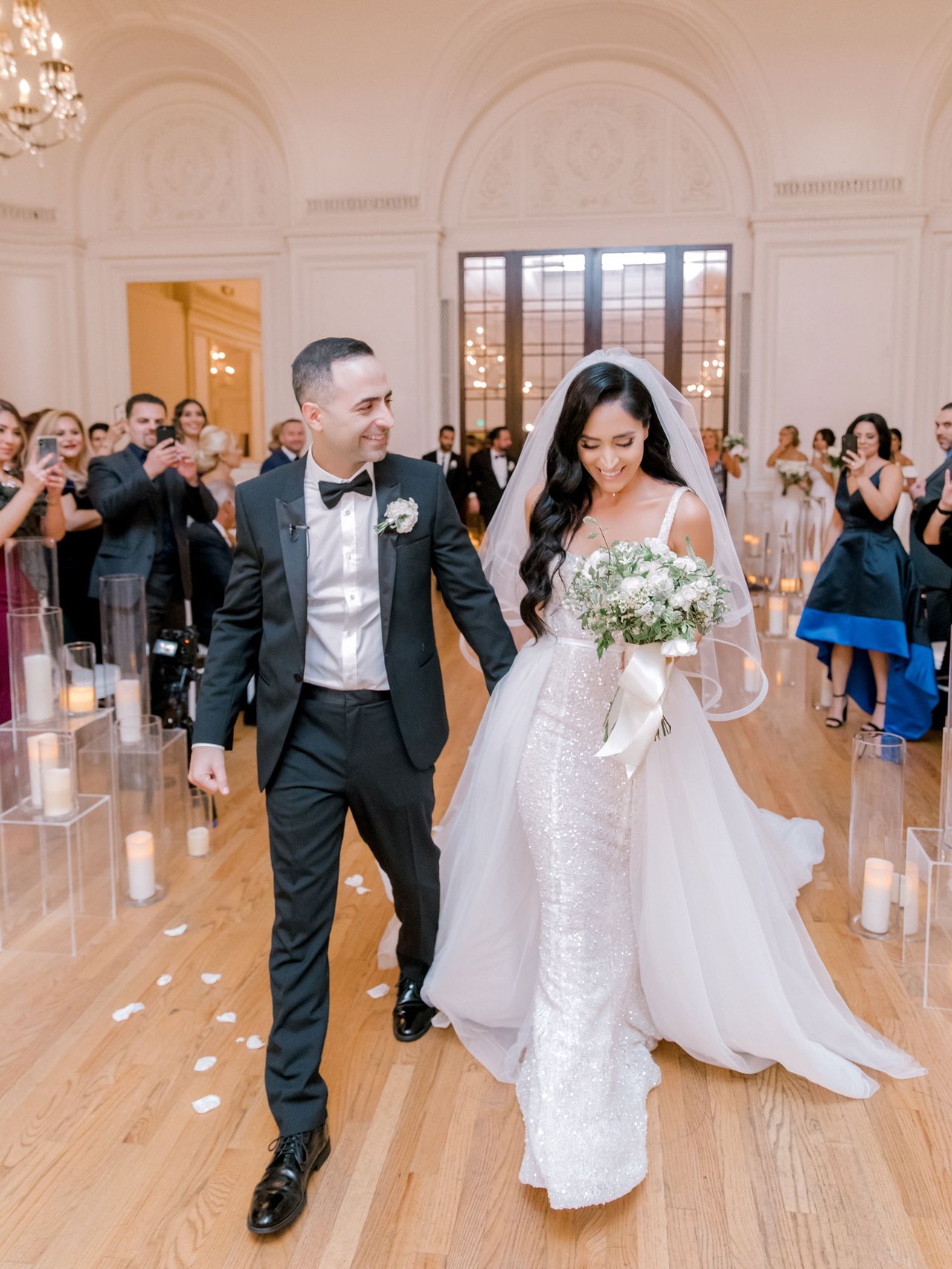 Bride & Groom Leaving Ceremony Ballroom