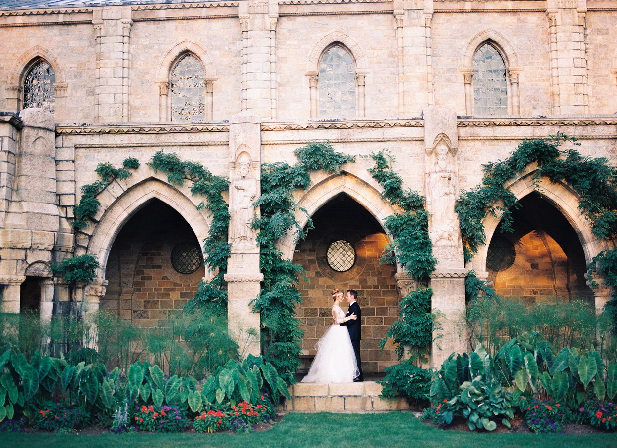 Bride and Groom Under Arches