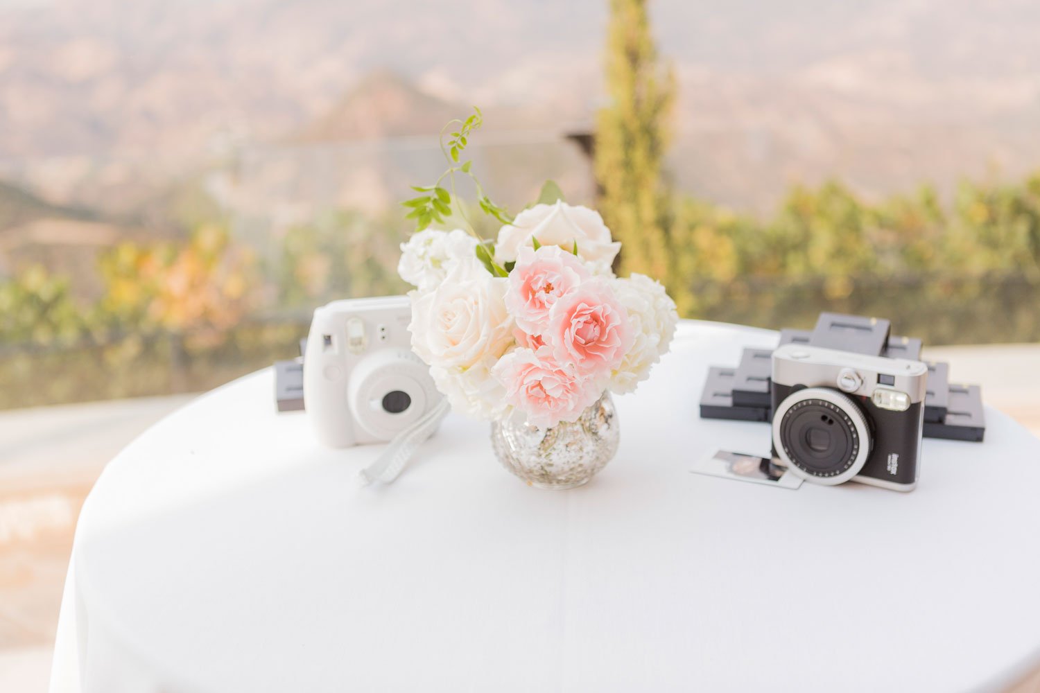 Cocktail Table with Instant Cameras