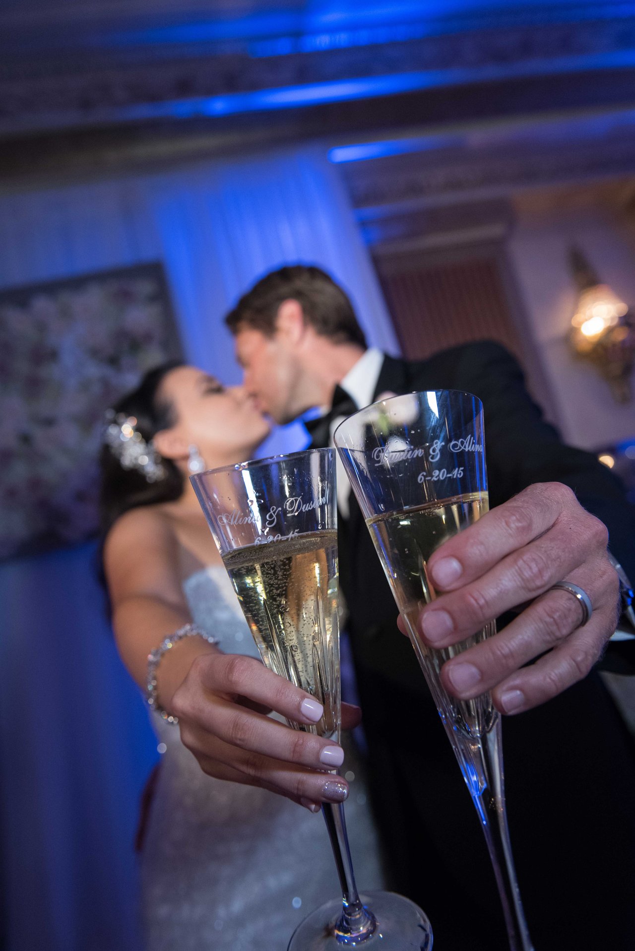 Bride & Groom Kissing and Toasting